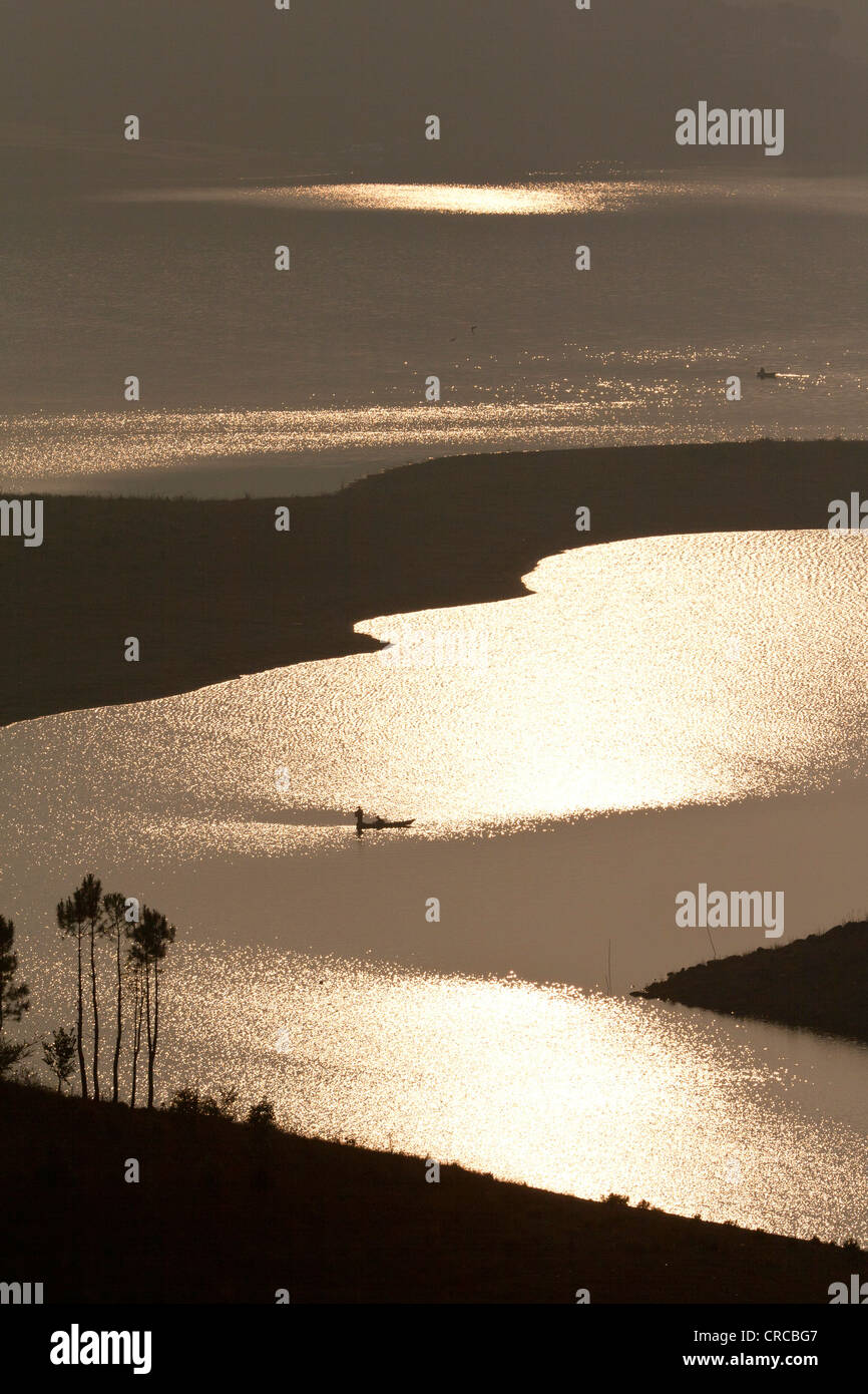 Dawn reflections on Umiam Lake, Umbir, Shillong, Meghalaya, India Stock ...