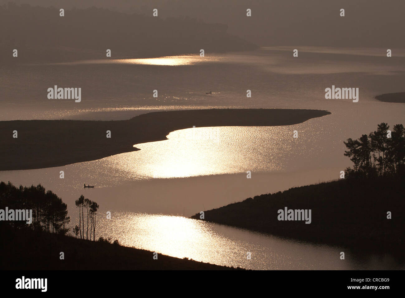 Dawn reflections on Umiam Lake, Umbir, Shillong, Meghalaya, India Stock ...
