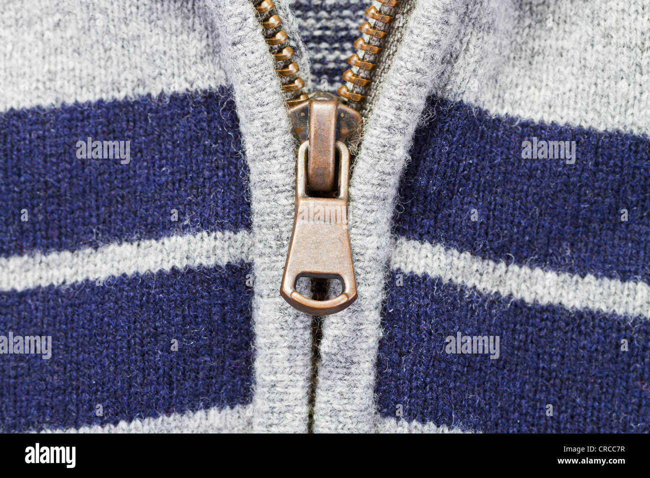 Partially unlocked zipper Stock Photo - Alamy