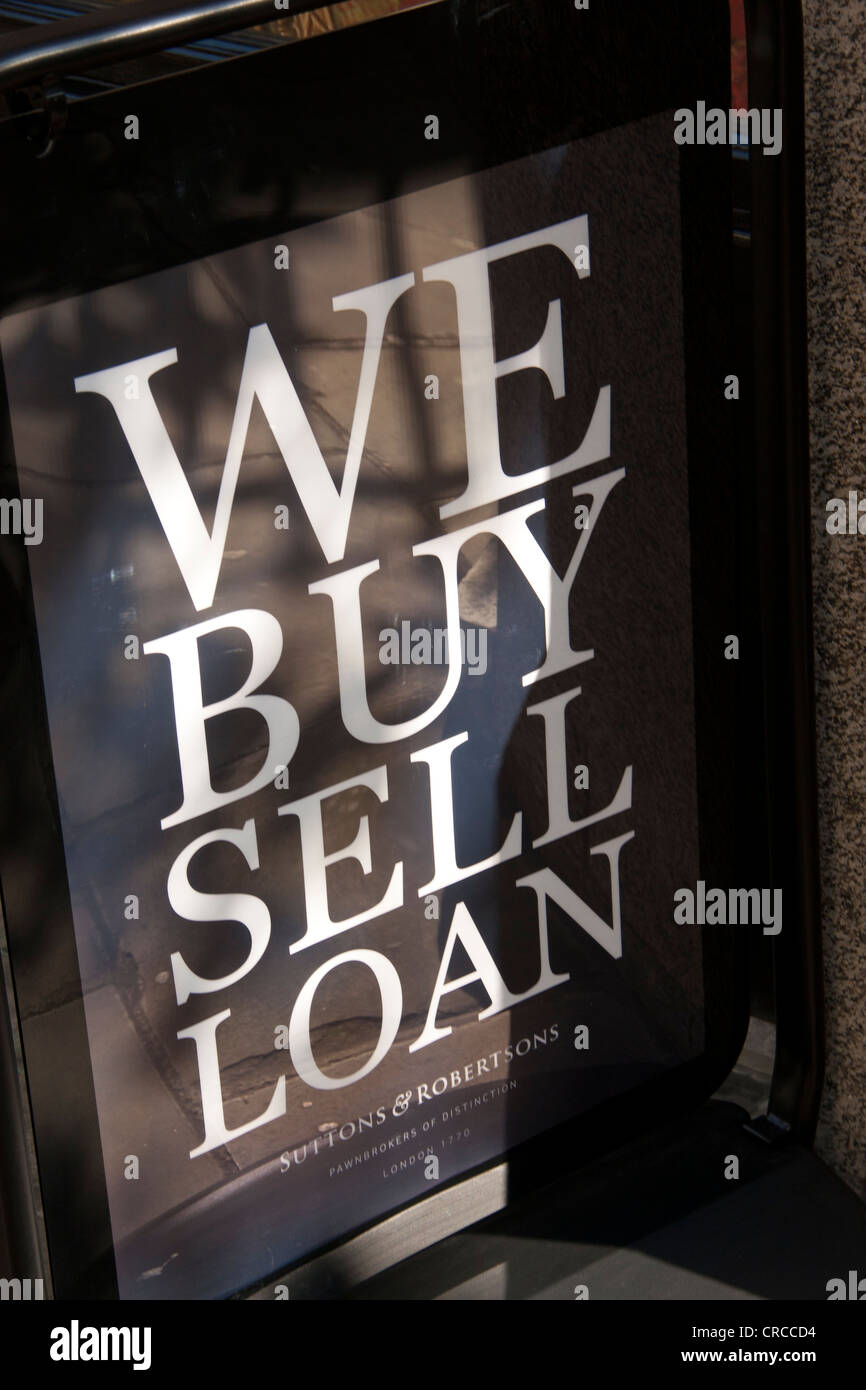 We Buy Sell Loan sign advertising pawnbrokers Suttons and Robertsons ...