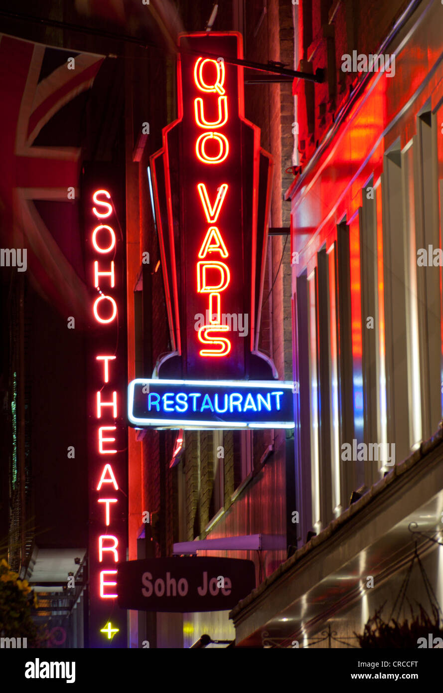 Soho Theatre and Quo Vadis restaurant neon signs at night Soho West End ...