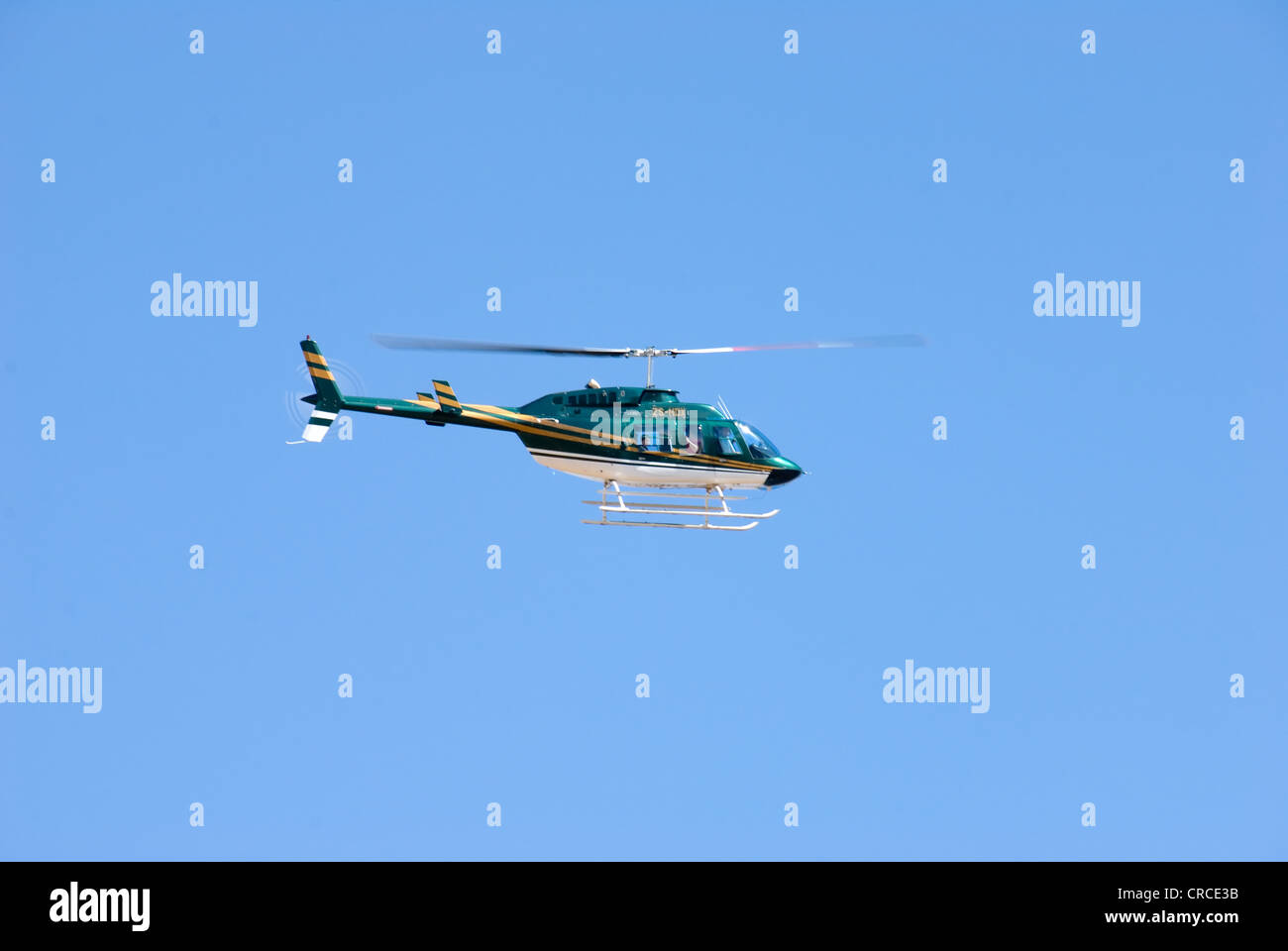 Helicopter flying in the sky Stock Photo - Alamy