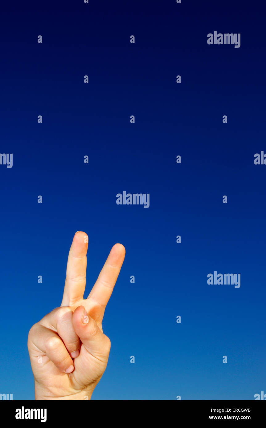 Hand making v sign hi-res stock photography and images - Alamy