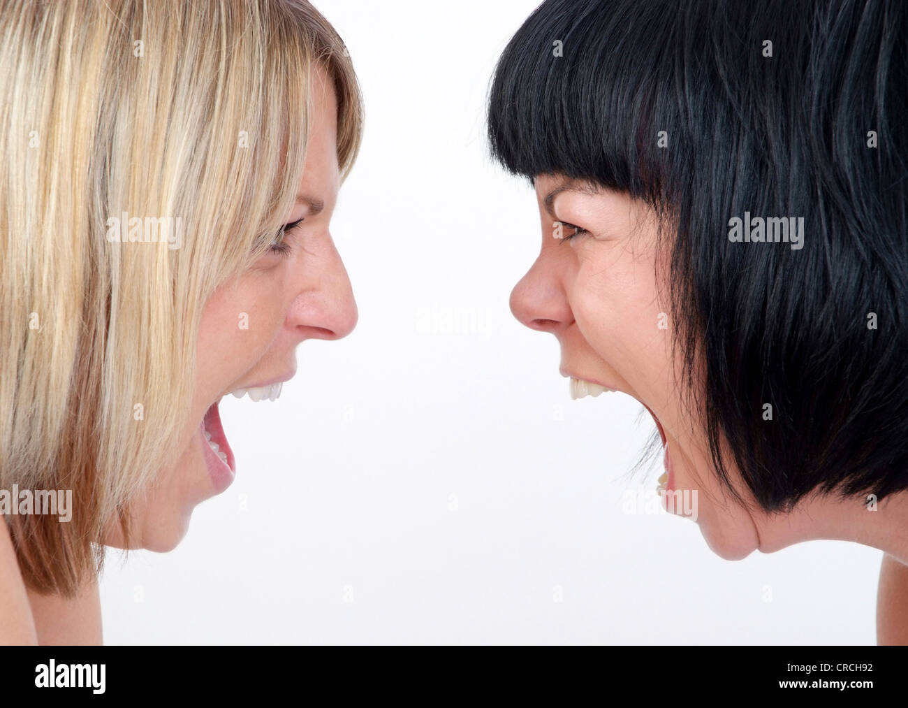 two women screaming at one another Stock Photo - Alamy