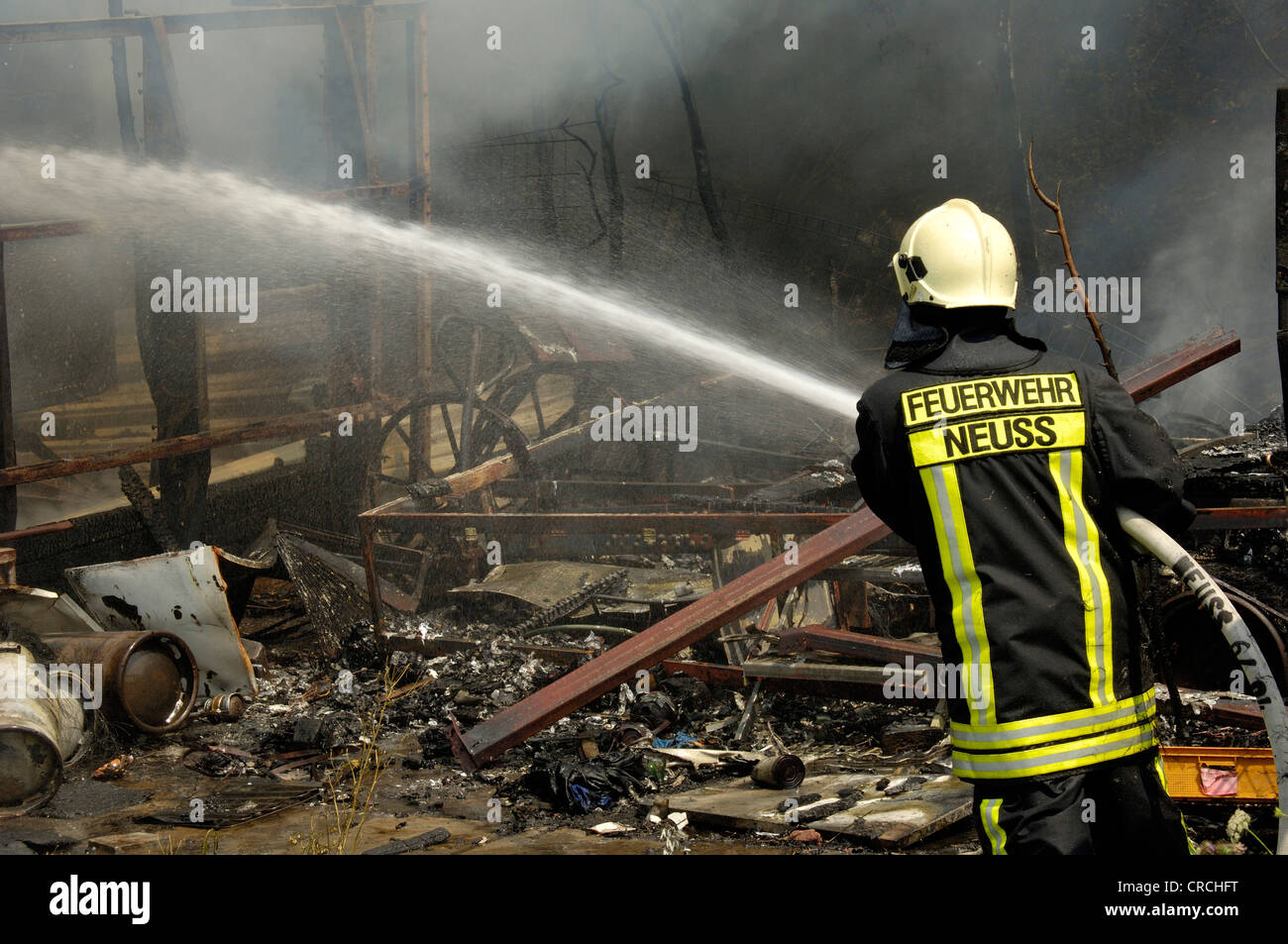 firefighter in full activity, Germany Stock Photo - Alamy