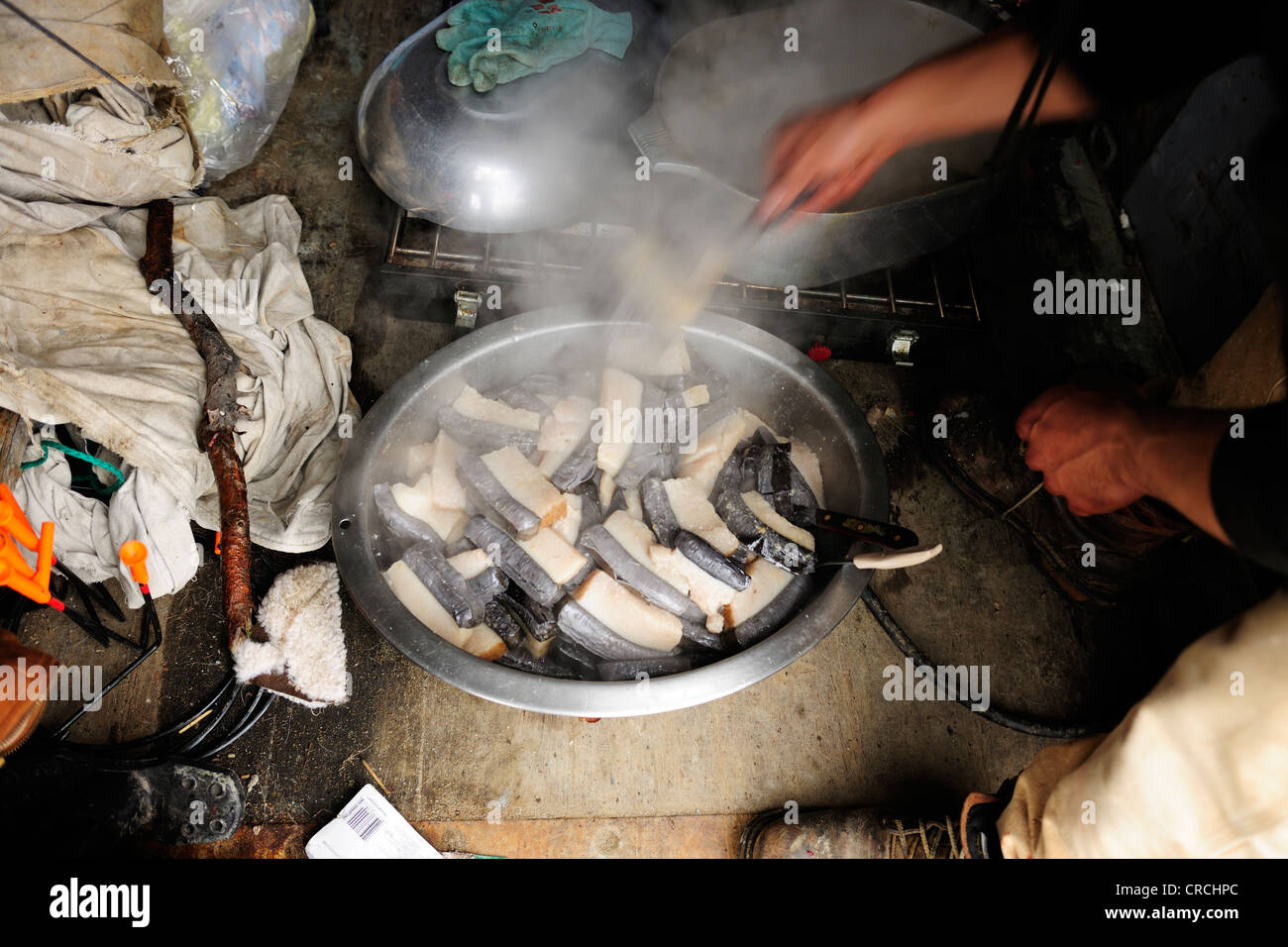 Alaska natives eating hi-res stock photography and images - Alamy