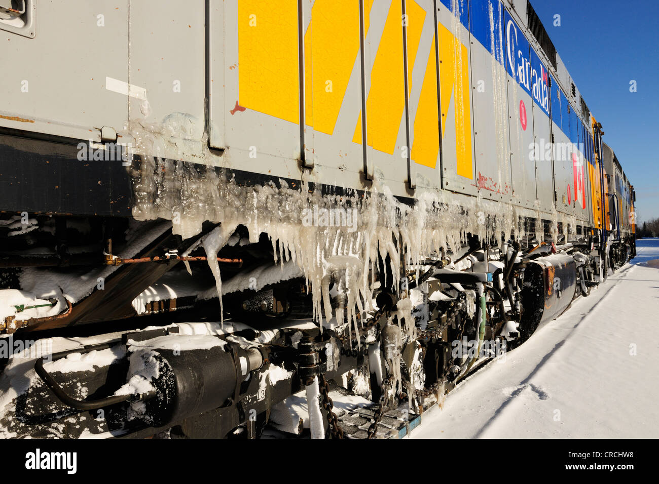 Ice-covered train on the railway line between Winnipeg and Churchill ...