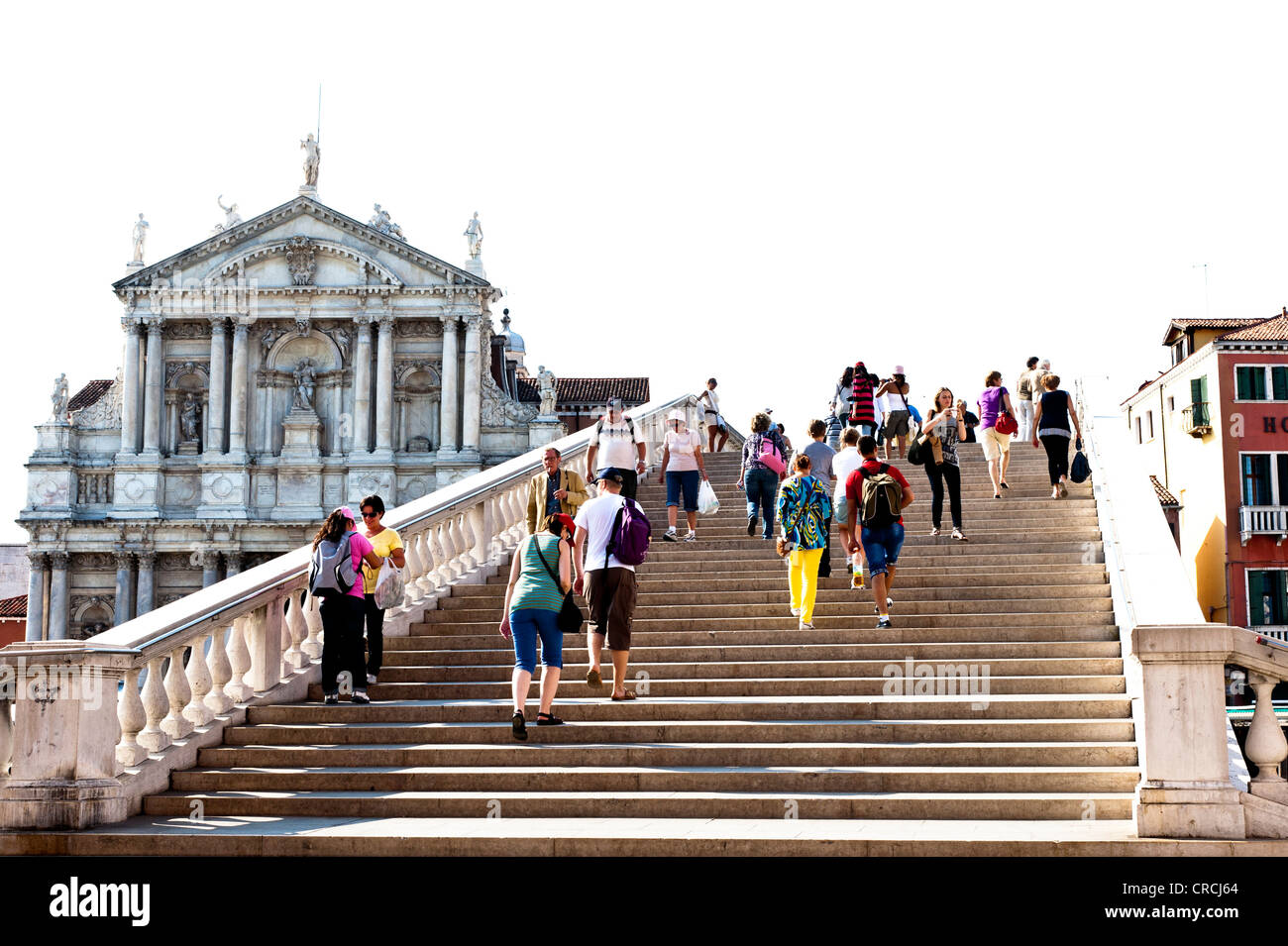 People on the stairs at the Ponte degli Scalzi bridge across the Grand ...