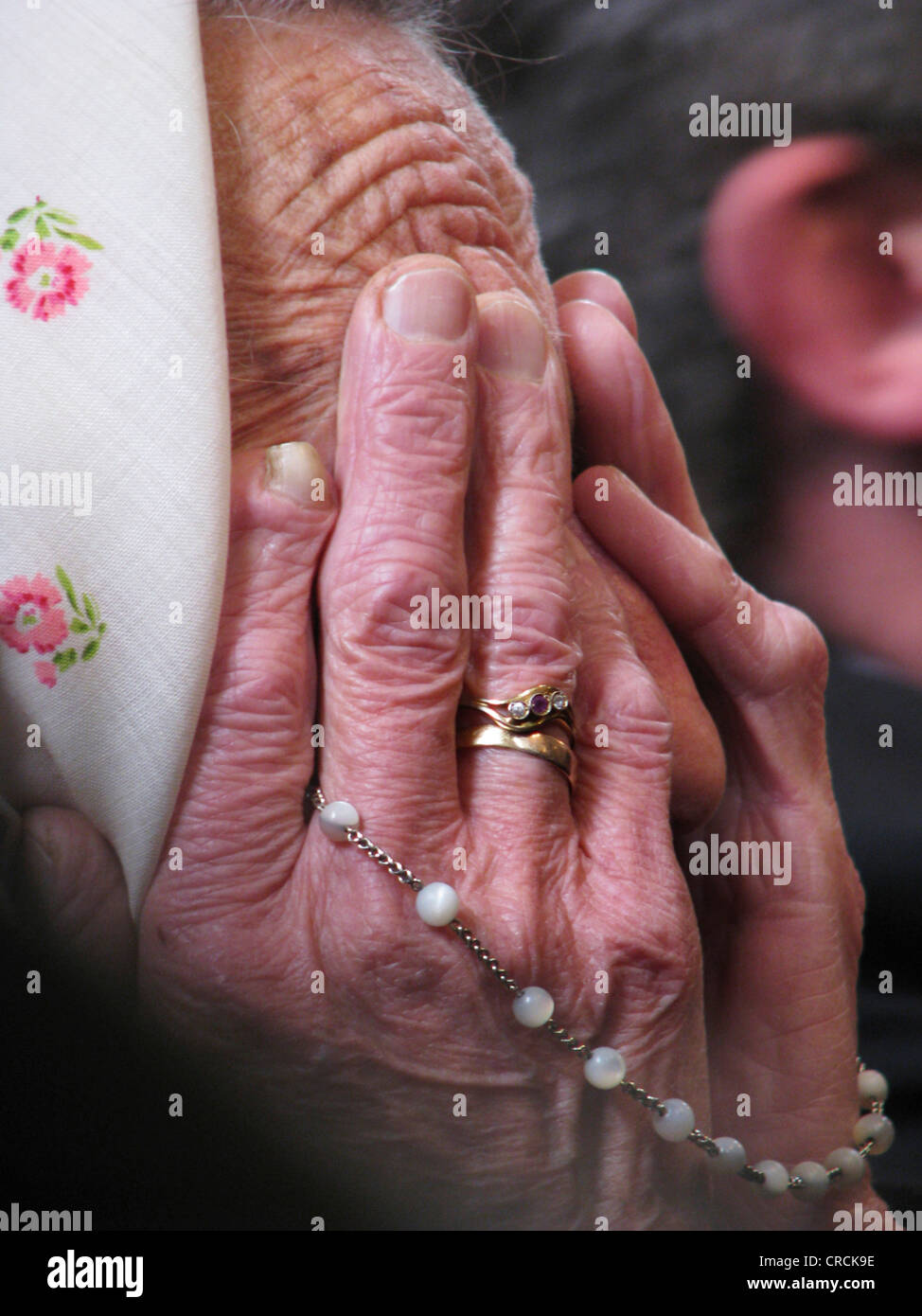 Praying hands over head hi-res stock photography and images - Alamy