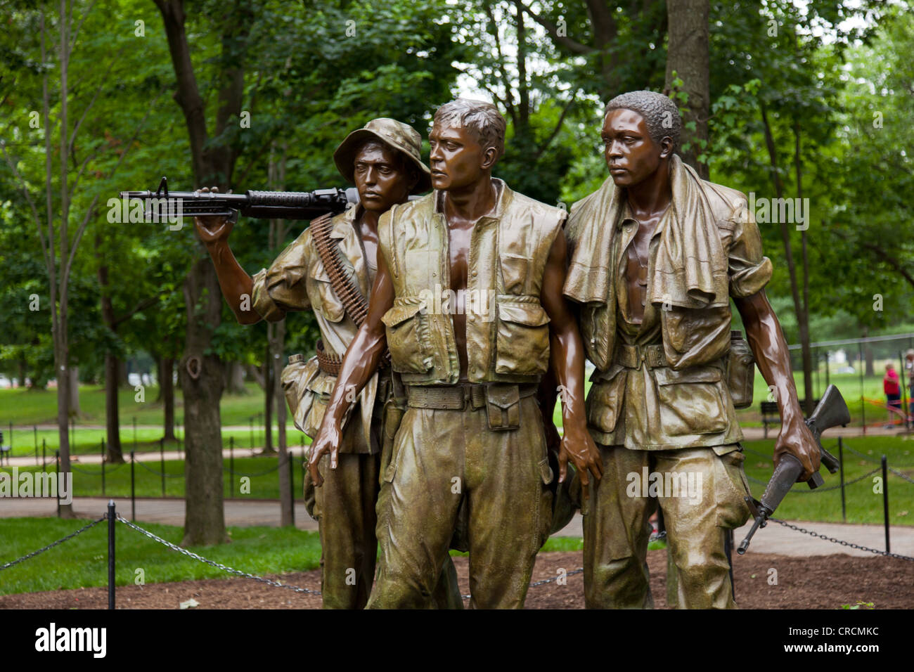 Vietnam Memorial of three soldiers looking towards the wall Stock Photo ...