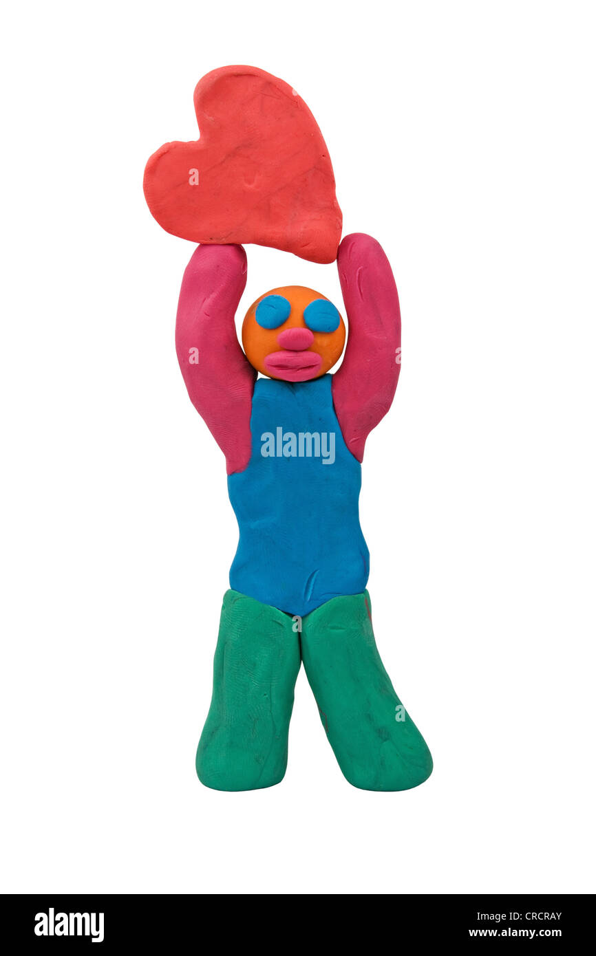 plasticine man hold heart. isolated on white Stock Photo - Alamy