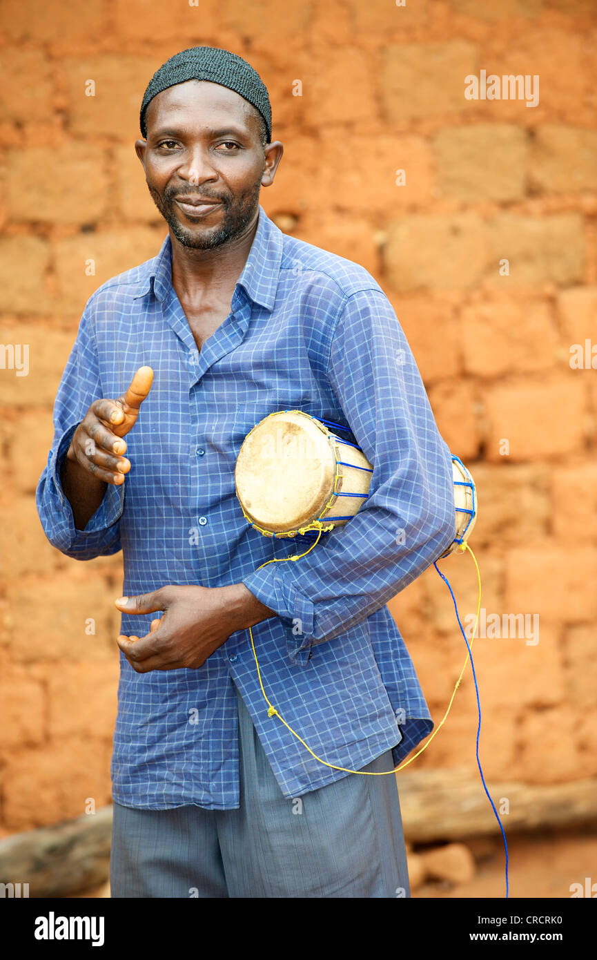 Man playing a traditional musical instrument, Bamenda, Cameroon, Africa ...