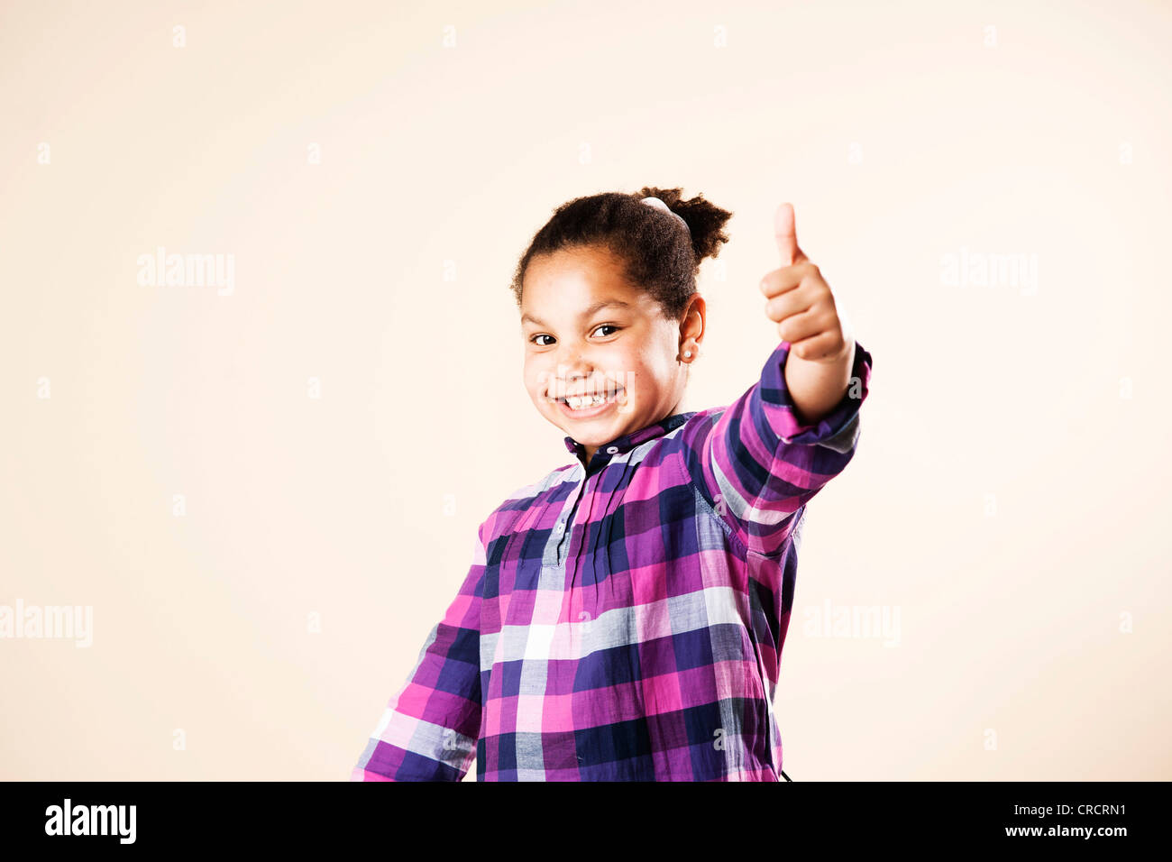 Smiling girl gesticulating Stock Photo - Alamy