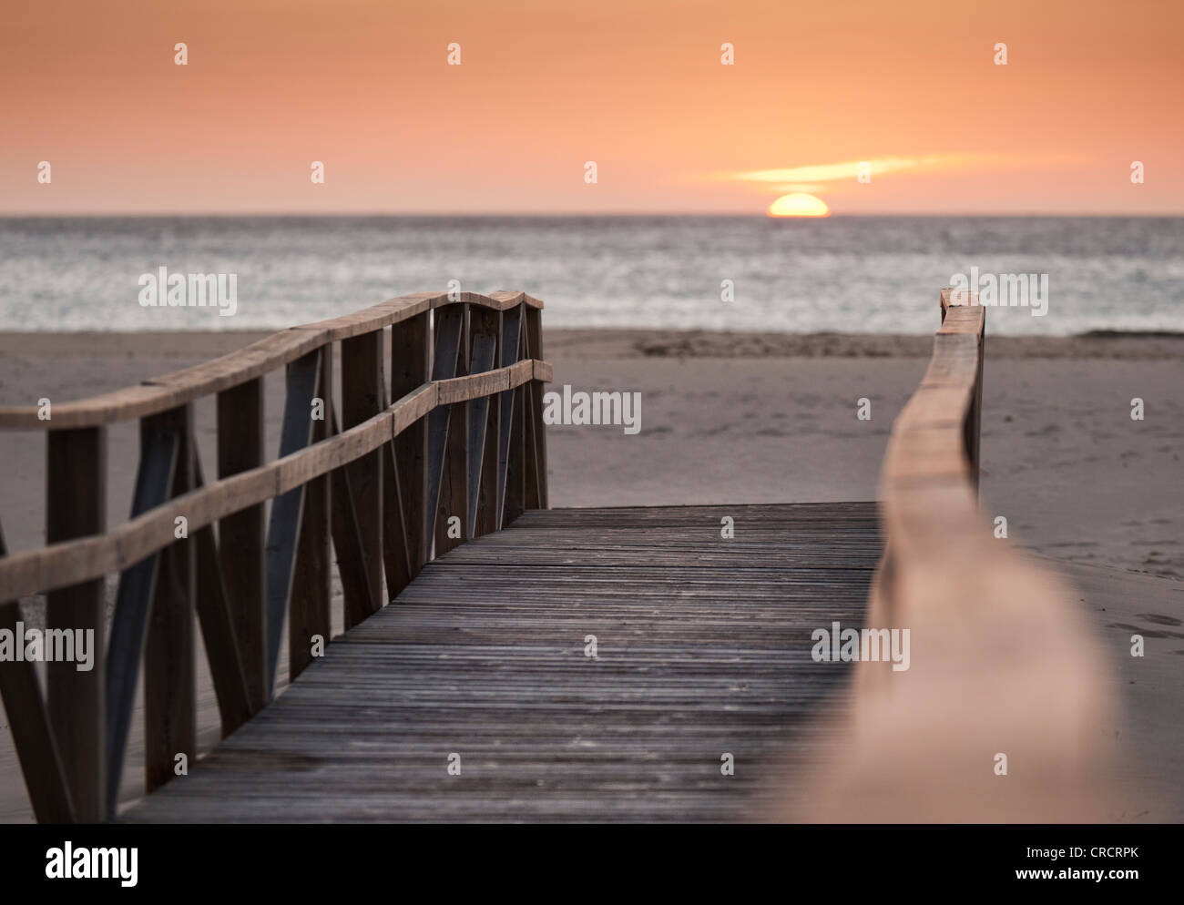Wooden path sunset beach hi-res stock photography and images - Alamy