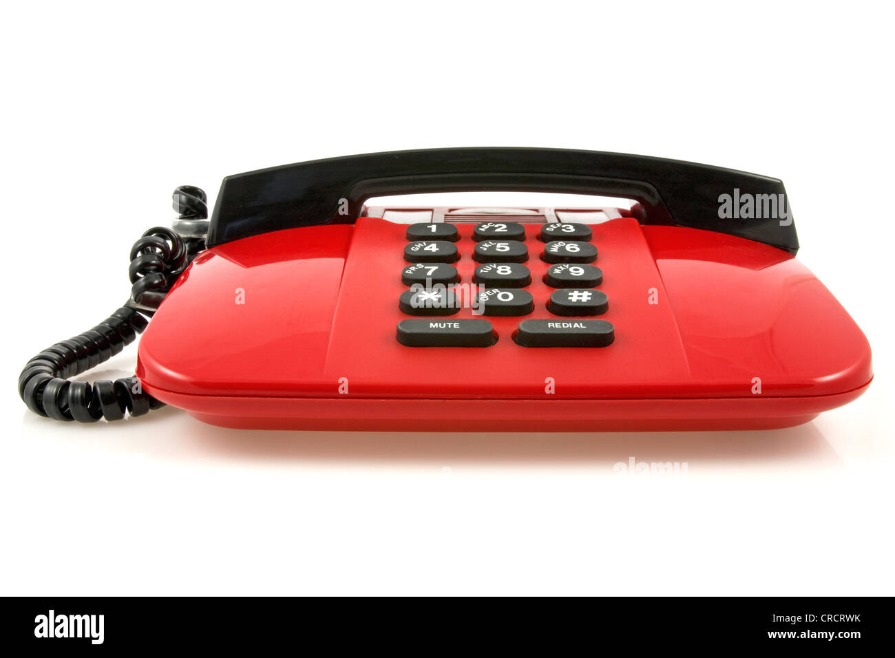 Red telephone set with reflection on white Stock Photo - Alamy