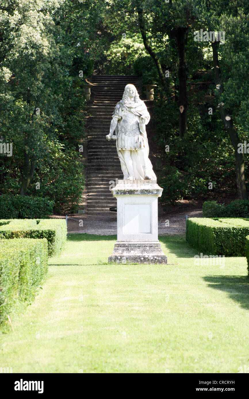 Garden with a statue Stock Photo - Alamy