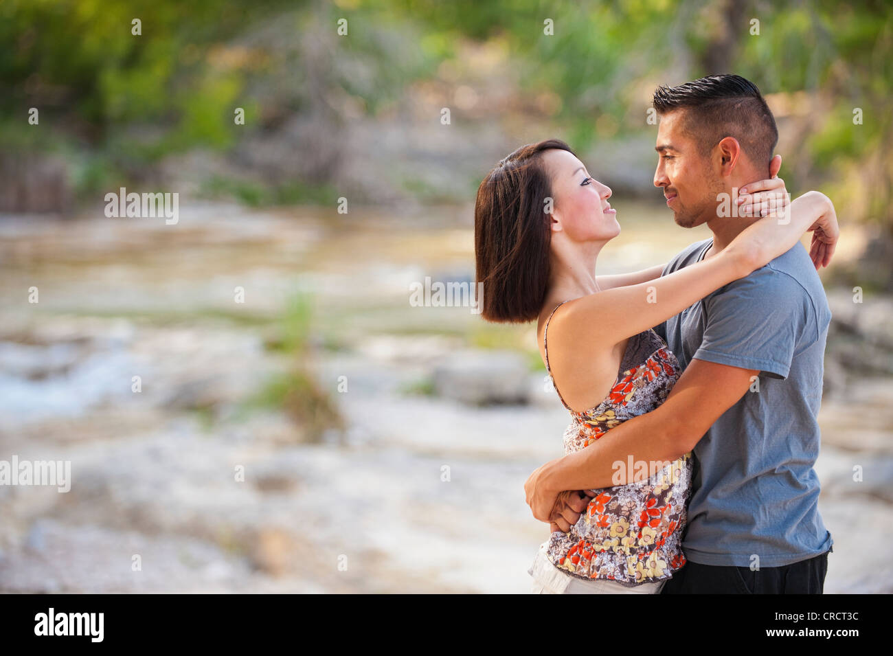 Young couple in love - man, 22, hispanic, woman, 20, korean, location ...