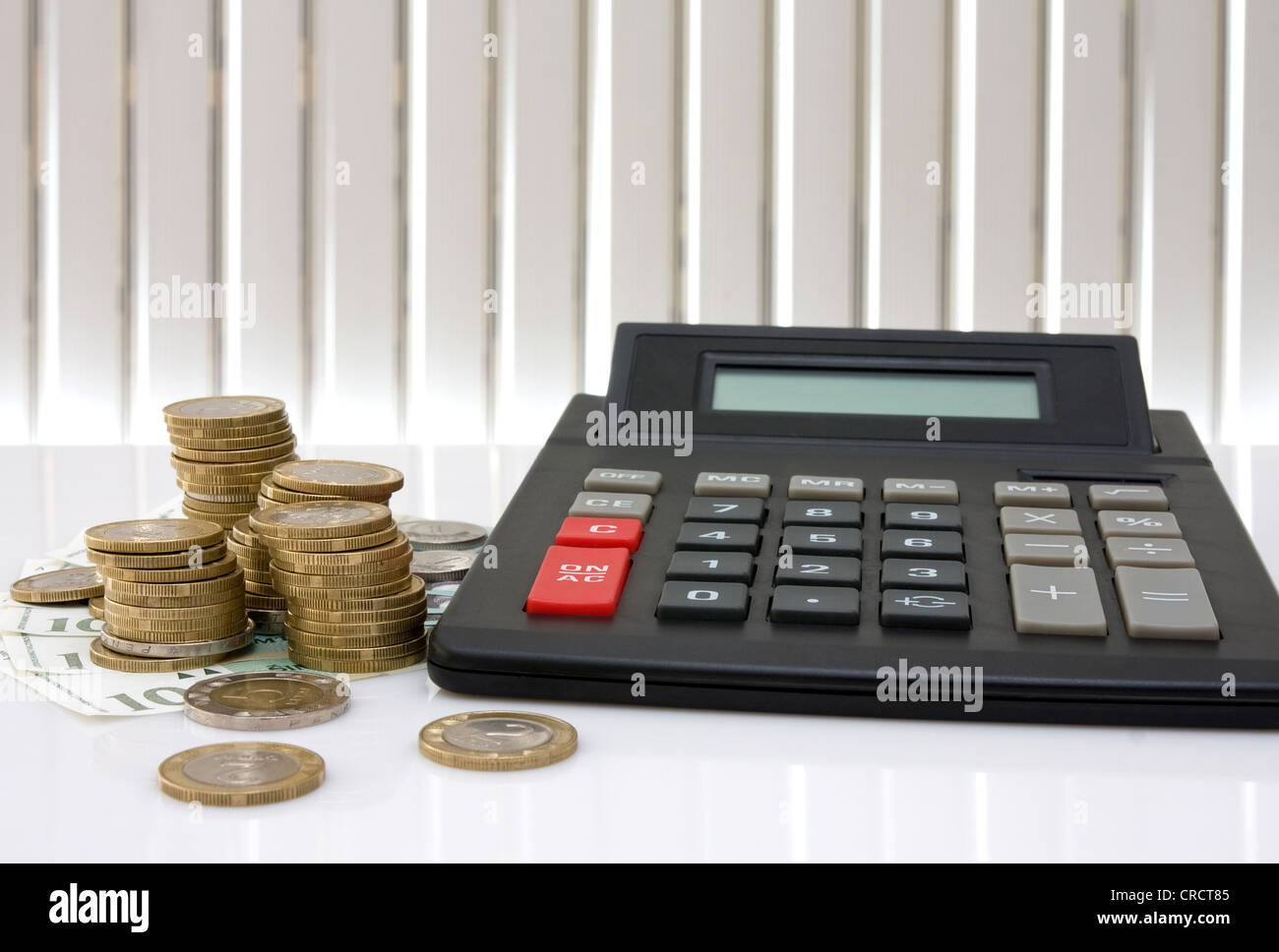 money and calculator showing accounting or savings concept Stock Photo ...