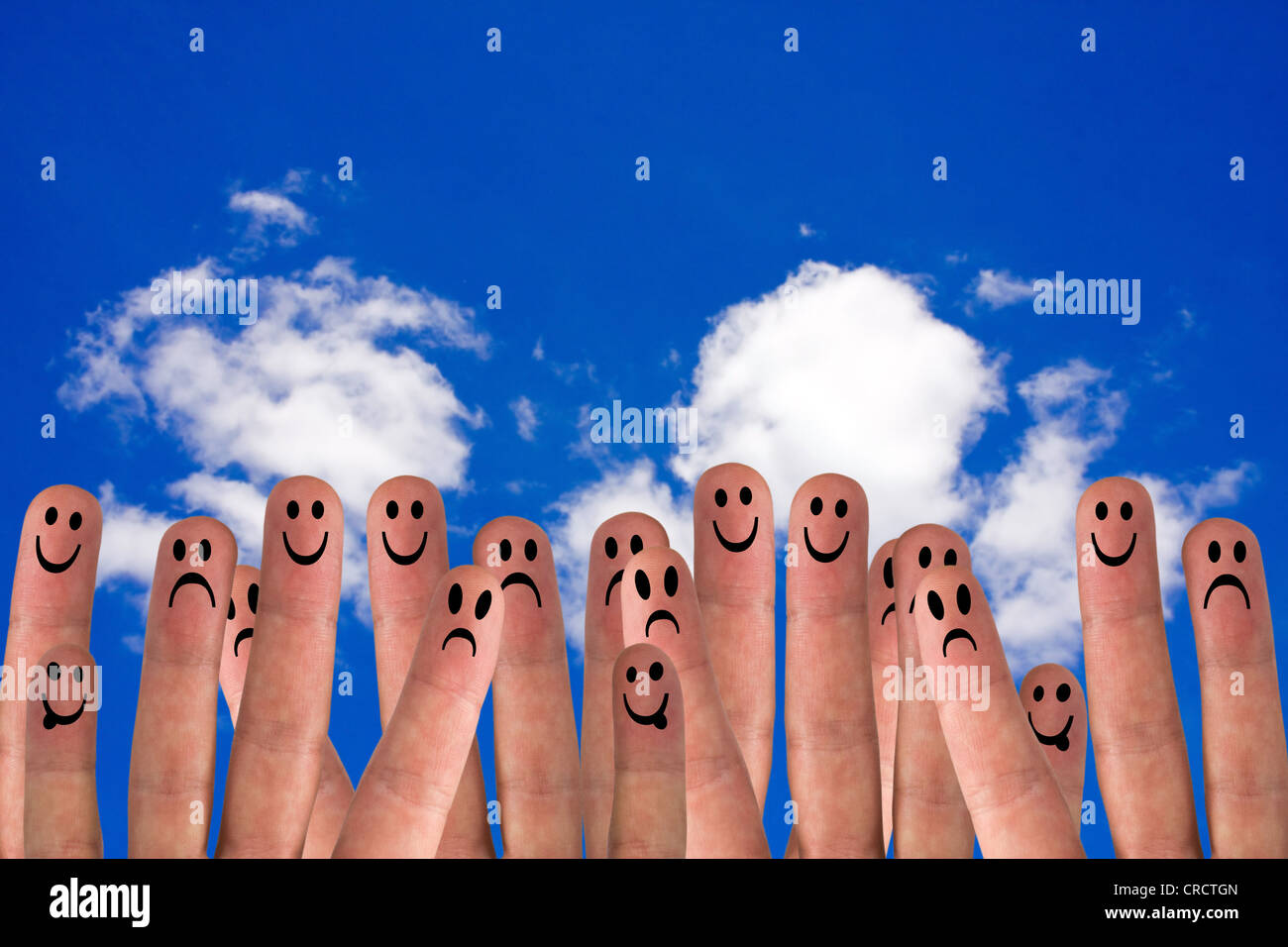 group of finger faces on the sky background Stock Photo - Alamy