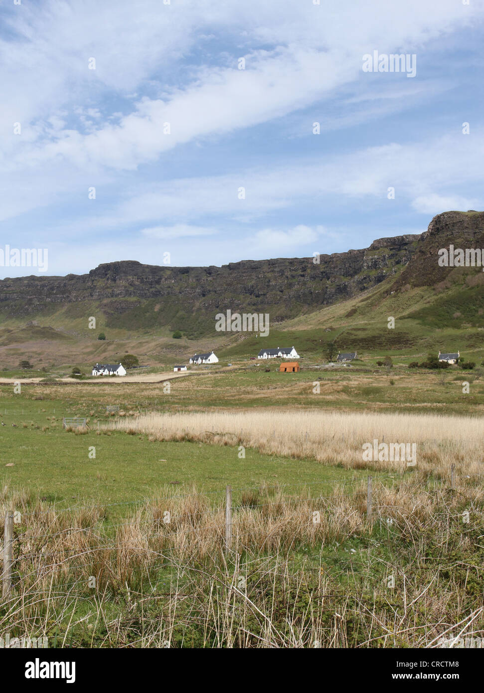 Cleadale with cliffs of Beinn Bhuidhe Isle of Eigg Scotland May 2012 ...