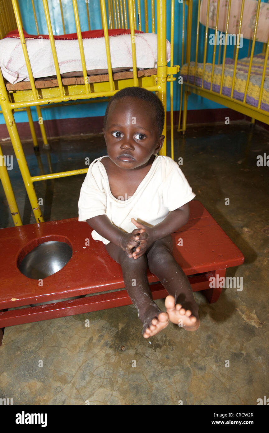 Small child on the potty in an orphanage near Bukoba, Tanzania, Africa ...