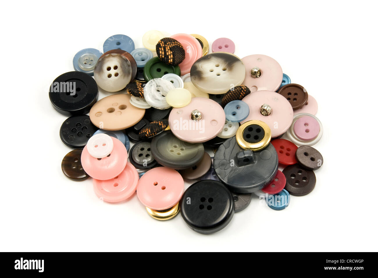 pile of various sewing buttons on white background Stock Photo - Alamy