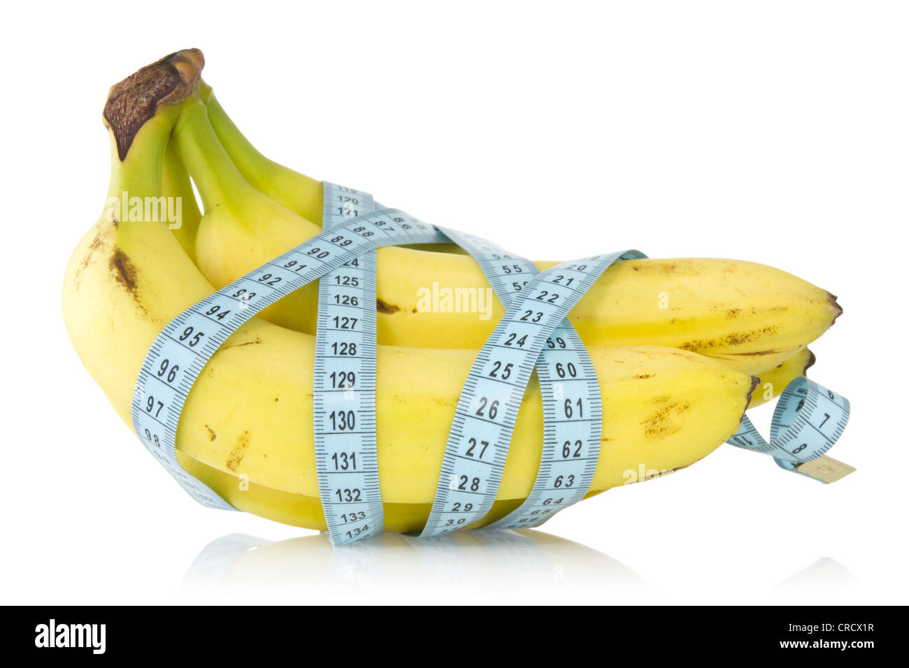 Bunch of bananas wrapped with measuring tape Stock Photo - Alamy