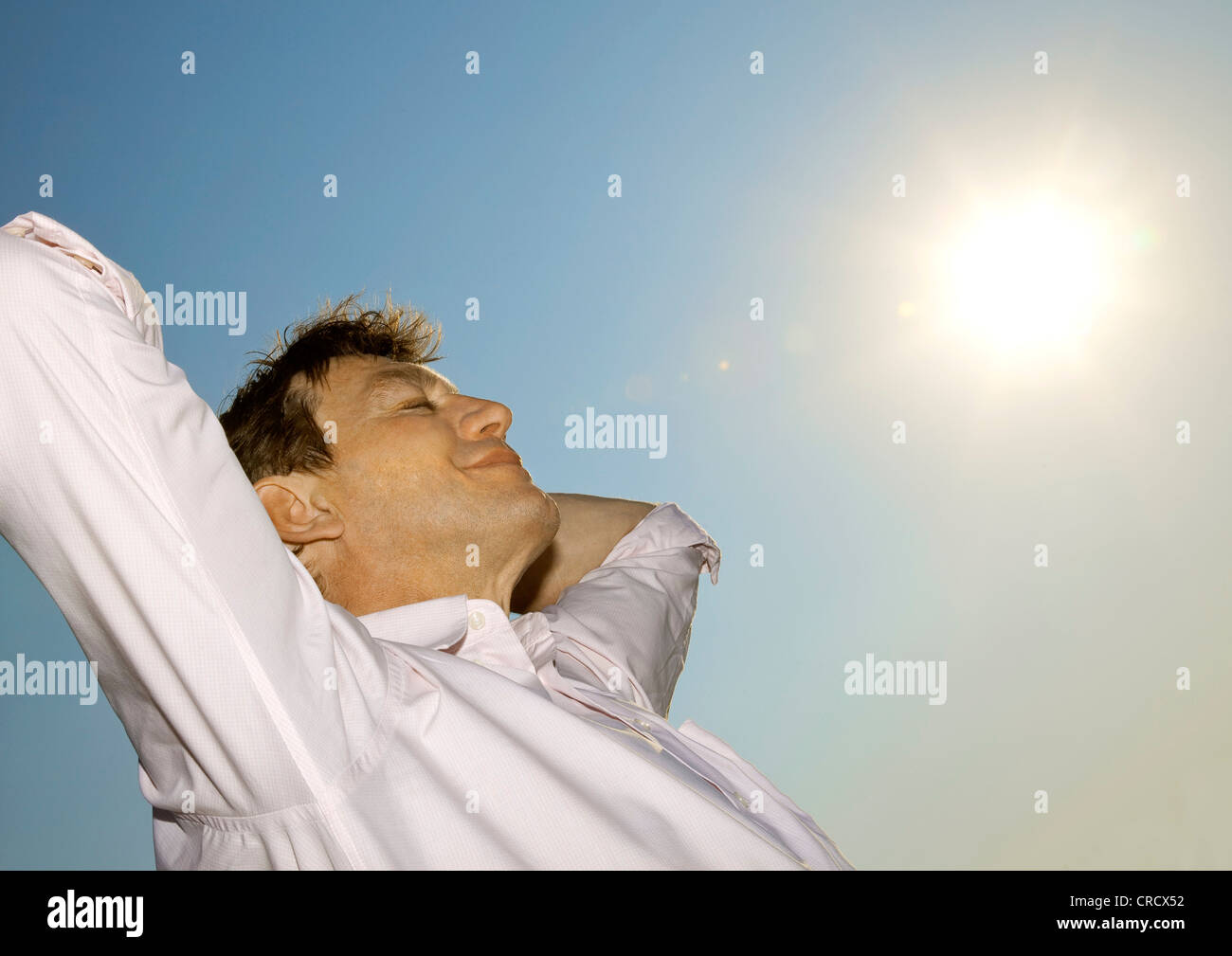 Man sunbathing back view hi-res stock photography and images - Alamy