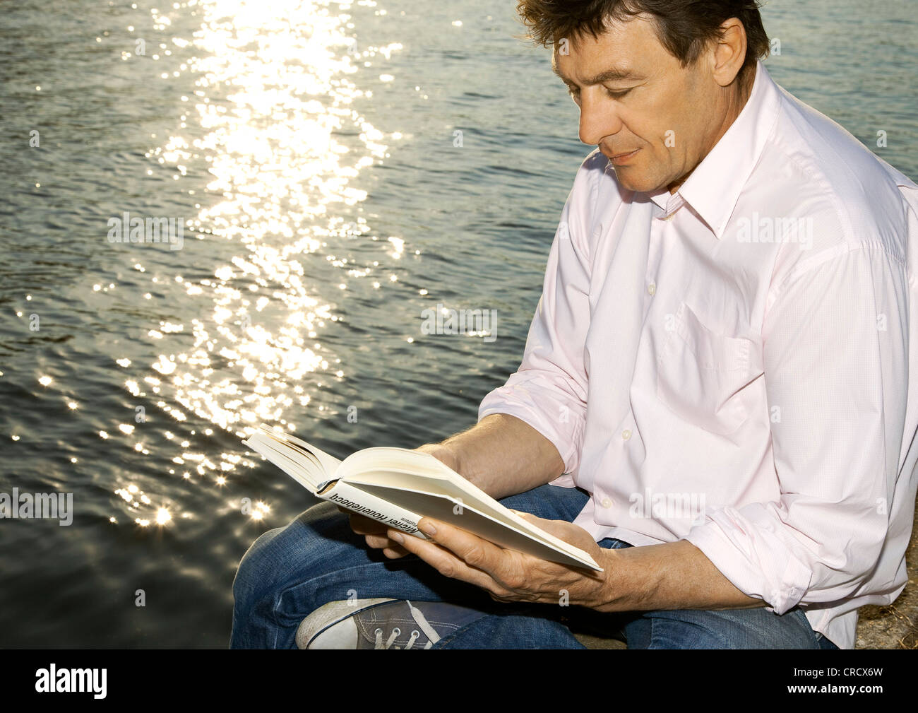 Top down shot man reading hi-res stock photography and images - Alamy
