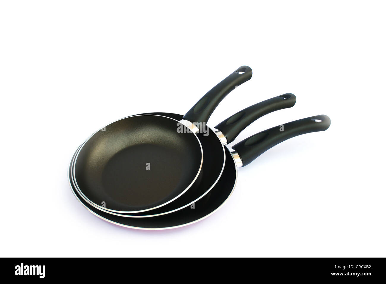 Three pans isolated on white background Stock Photo - Alamy