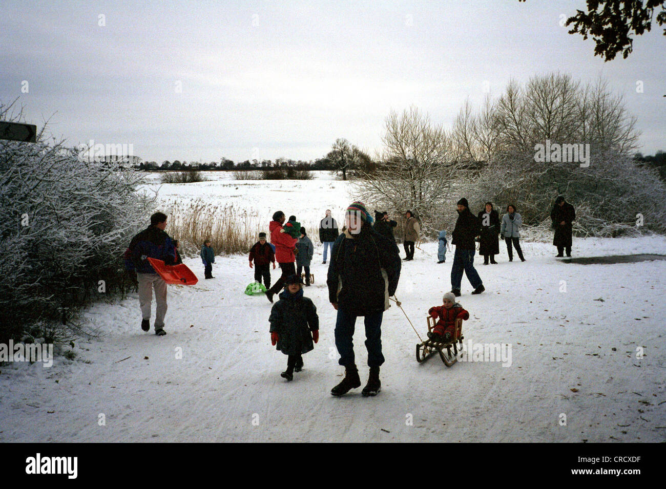 People walk in a winter landscape Stock Photo - Alamy