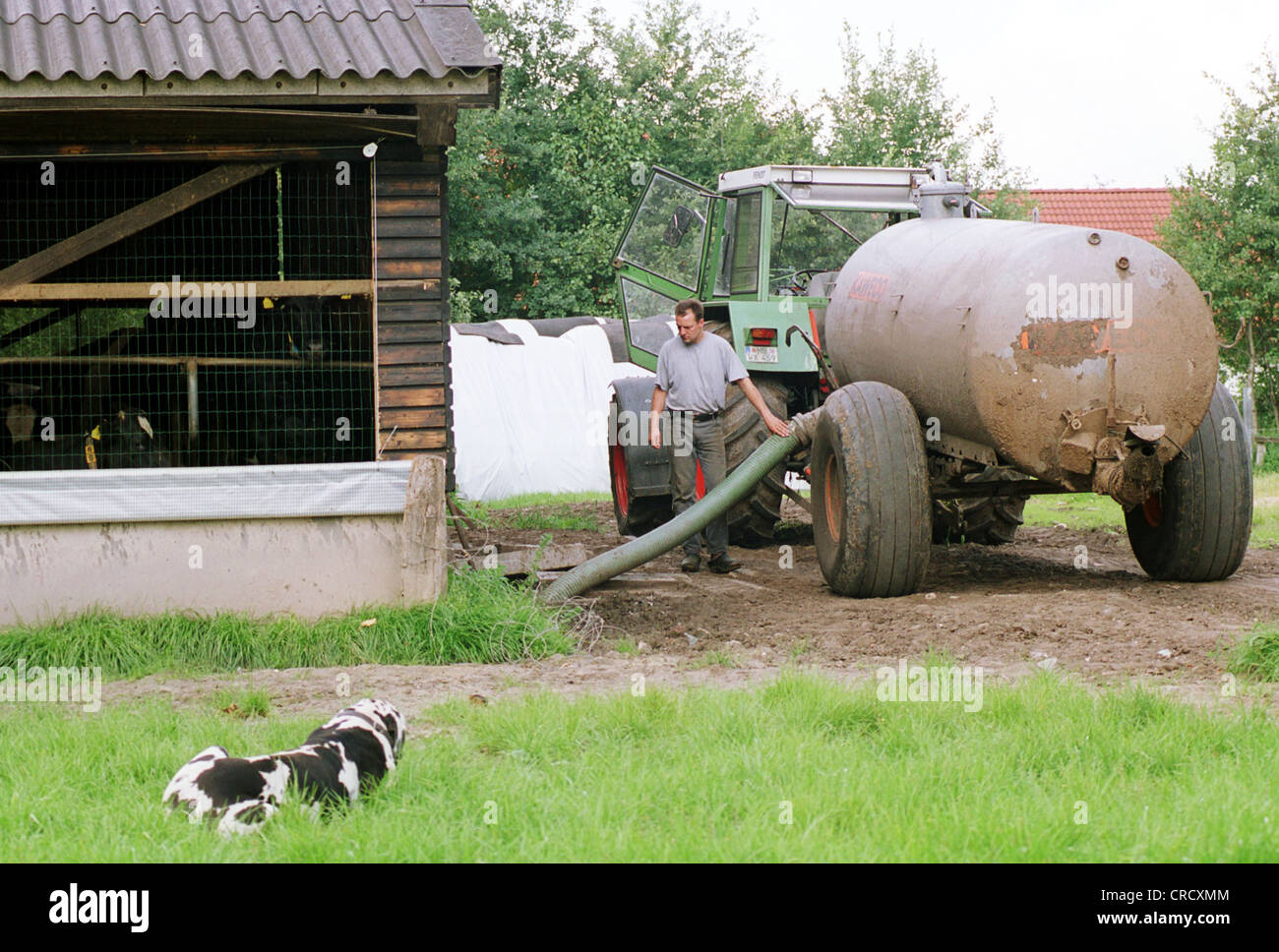 Farmer pumped from liquid manure Stock Photo - Alamy