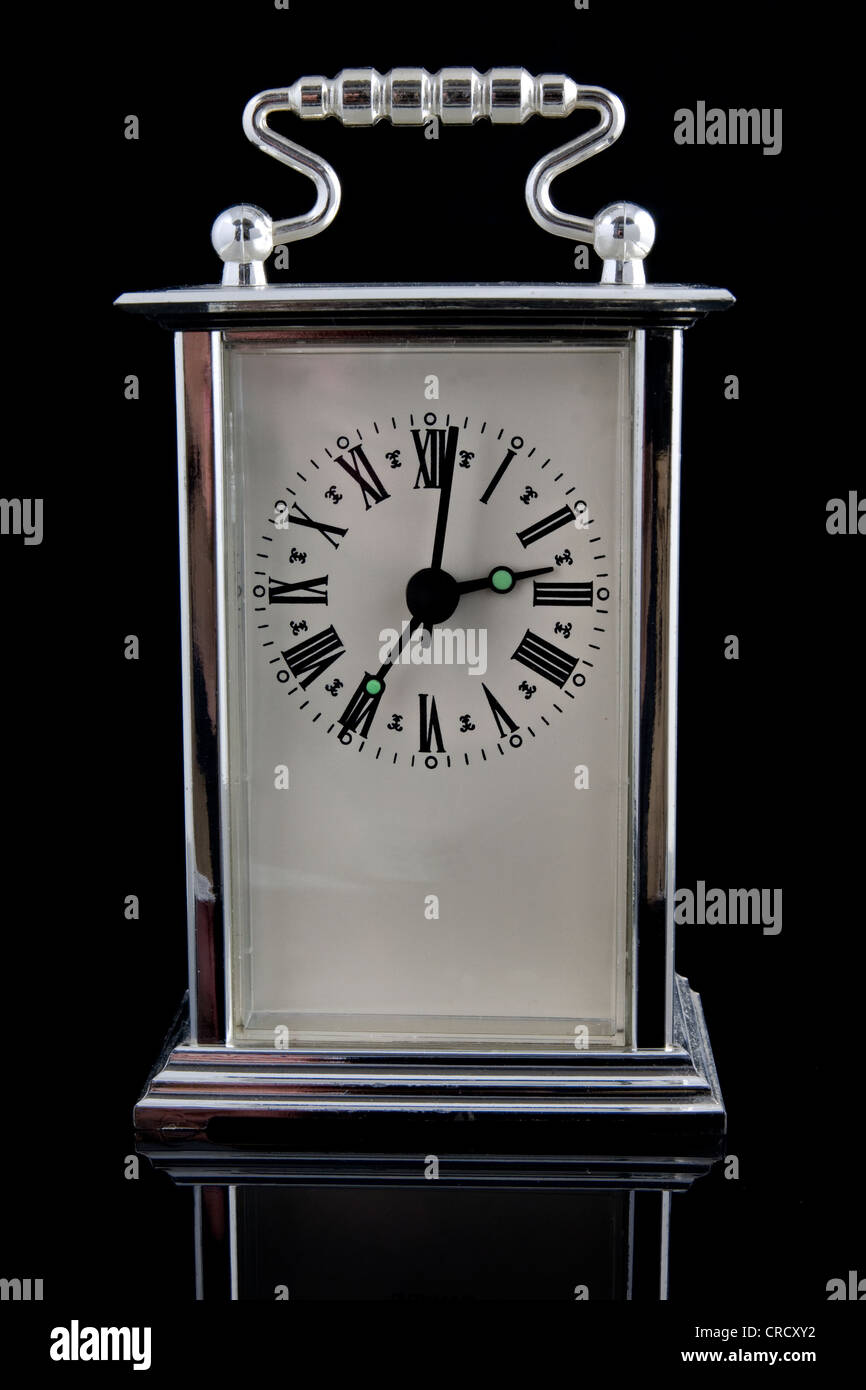 old clock on black background with reflection Stock Photo - Alamy