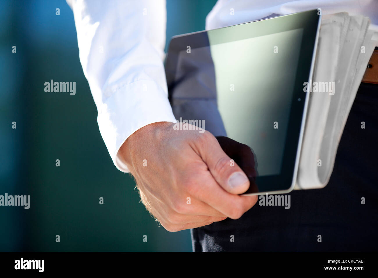 Carrying under arms hi-res stock photography and images - Alamy