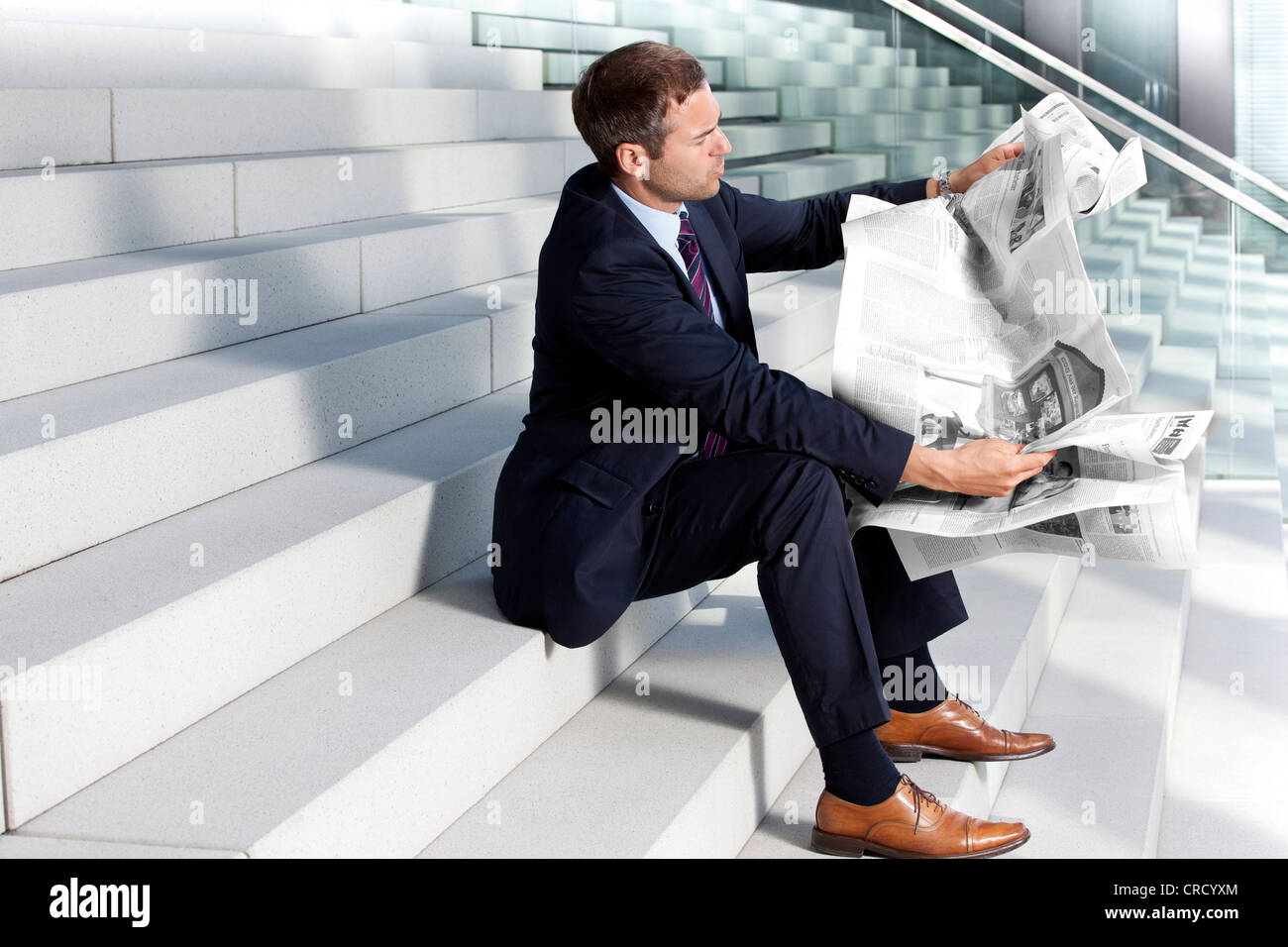 Step on newspaper hi-res stock photography and images - Alamy