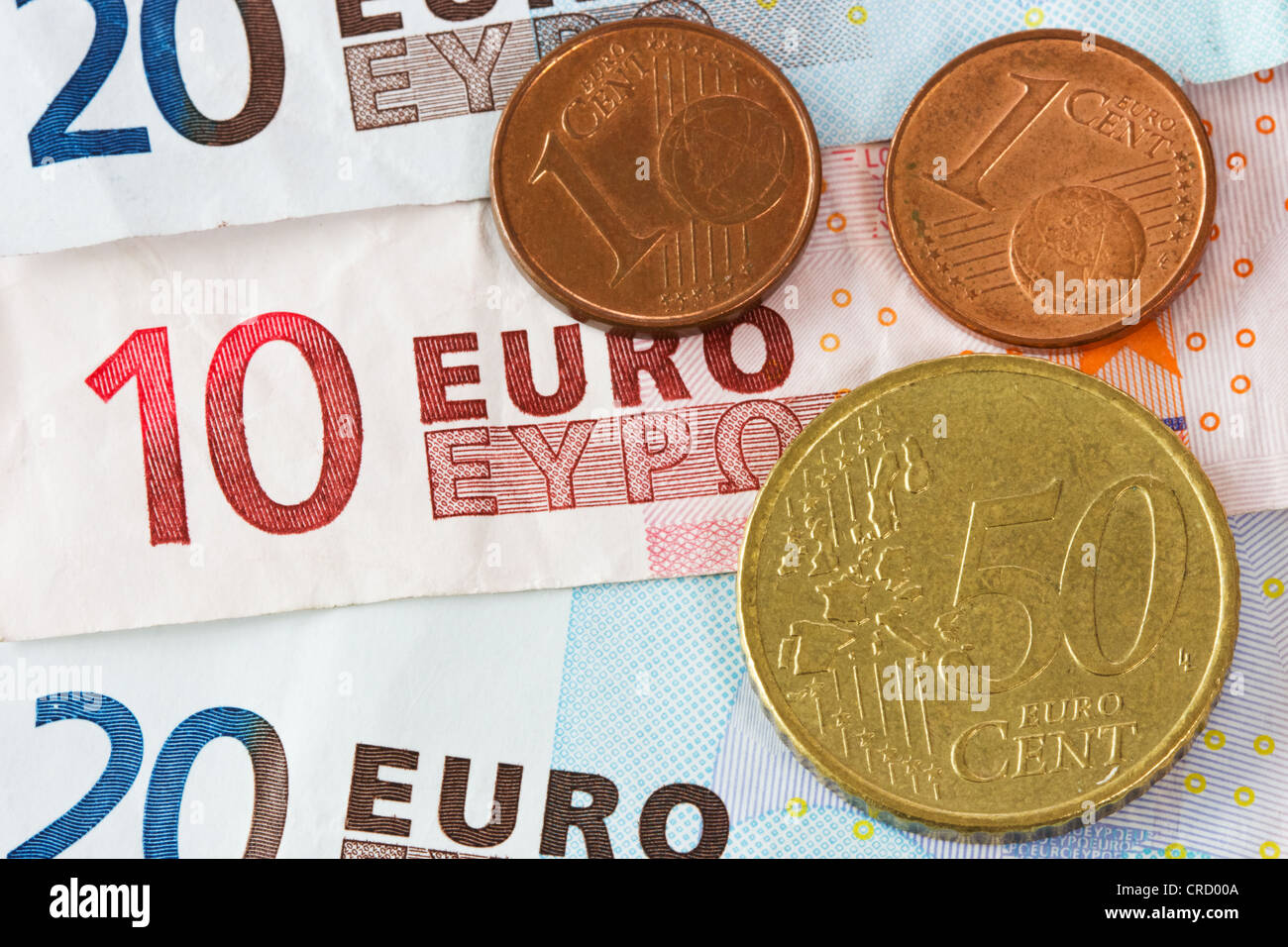 close up background of Euro banknotes and coins Stock Photo - Alamy