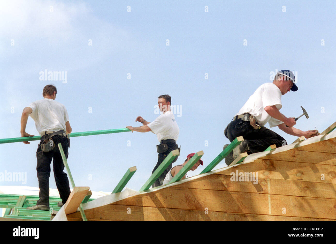 Carpenter construction roof truss hi-res stock photography and images ...
