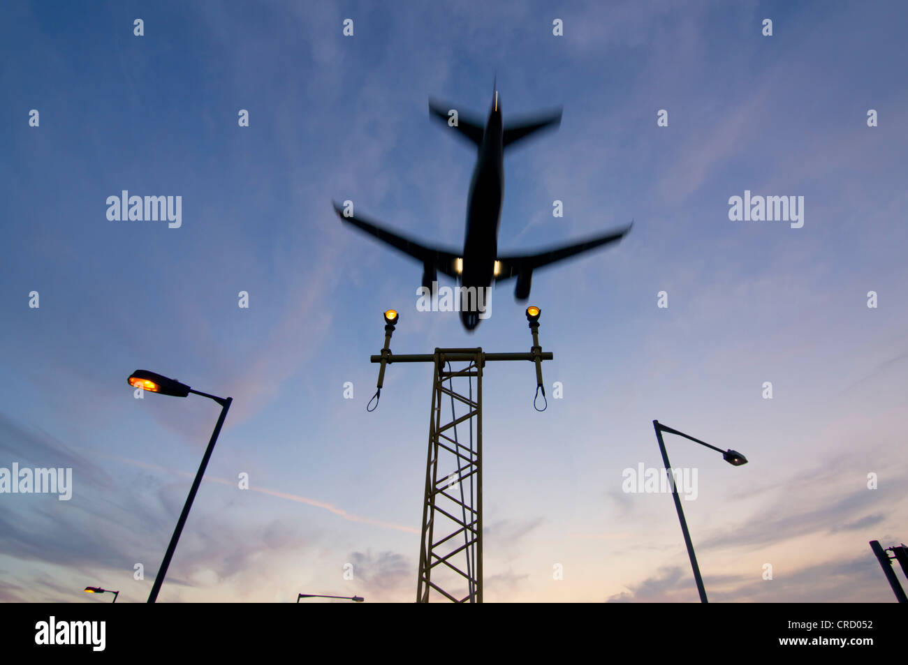 Airplane at sky Stock Photo - Alamy