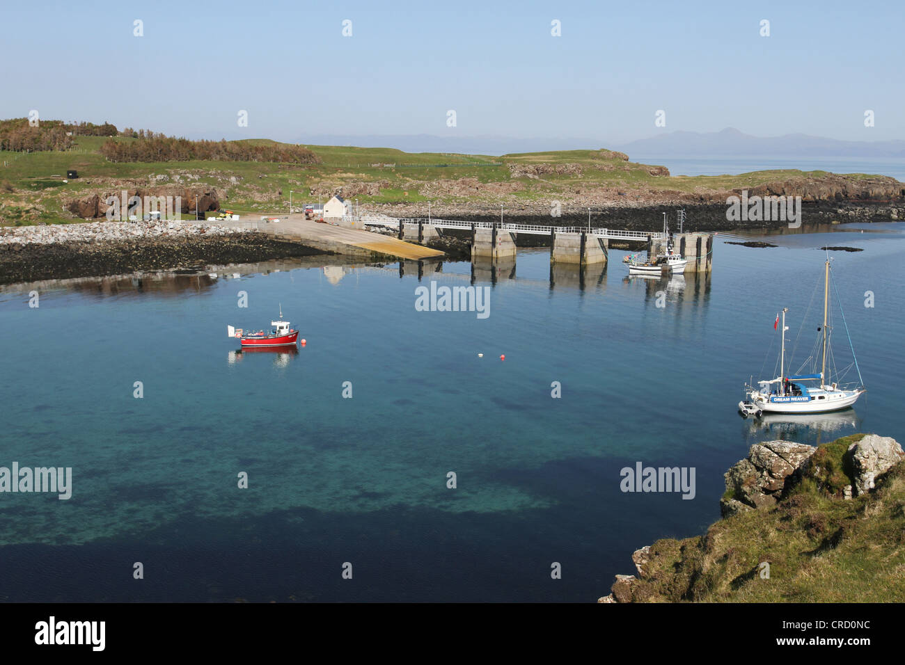 boats in Port Mor harbour Isle of Muck Scotland May 2012 Stock Photo ...