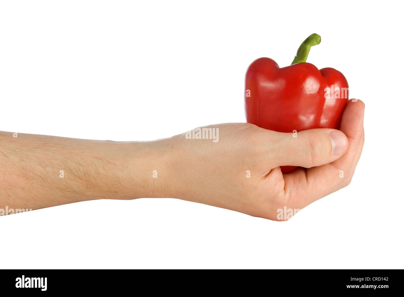 hand with a sweet pepper. isolated on white Stock Photo - Alamy