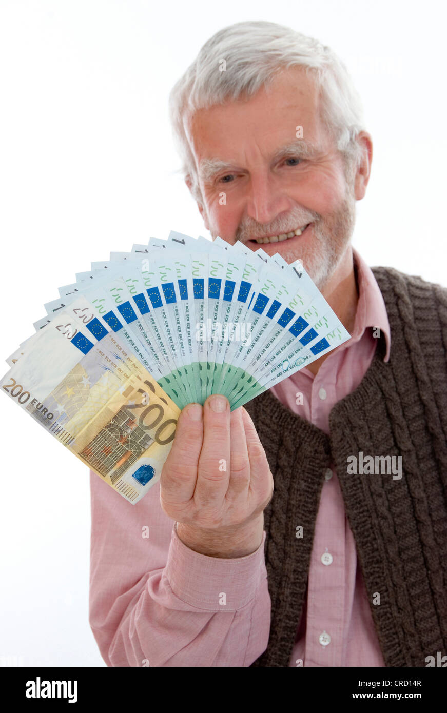 retiree with money Stock Photo - Alamy