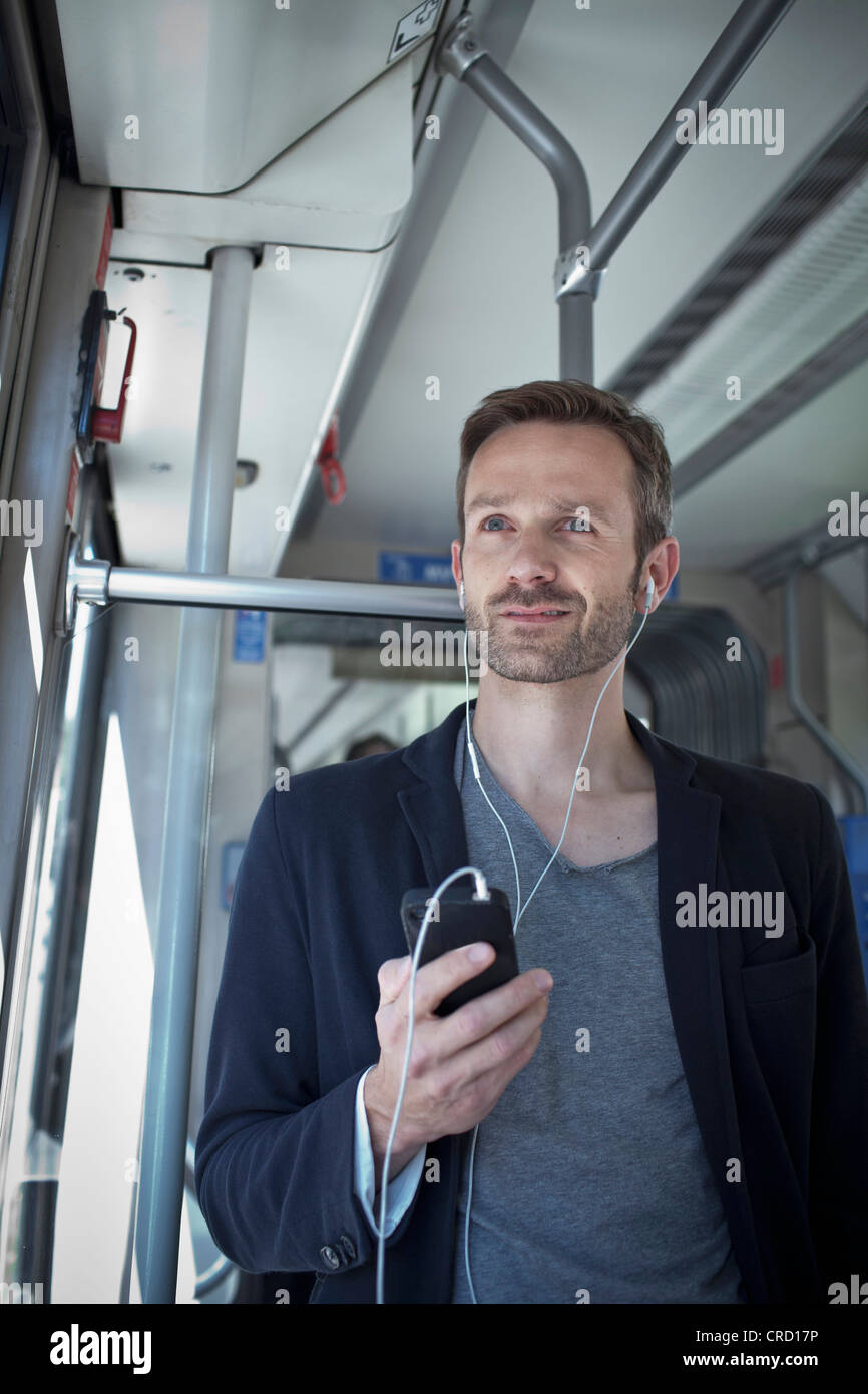 Man iphone train hi-res stock photography and images - Alamy