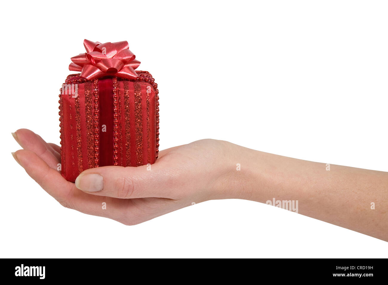 hand and gift over a white background Stock Photo - Alamy