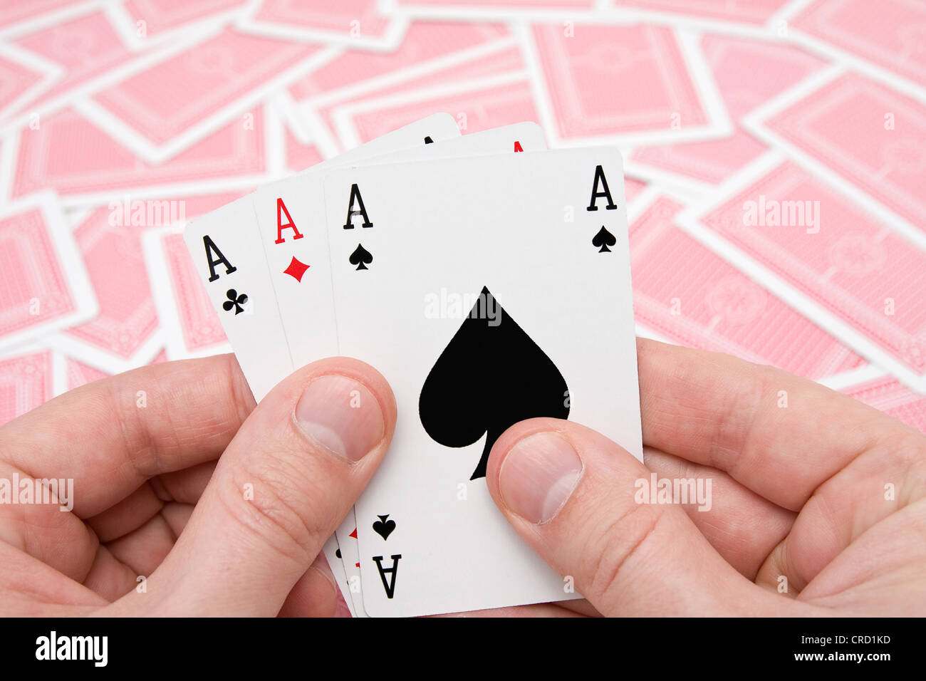 concept for gamble . hands with three aces Stock Photo - Alamy