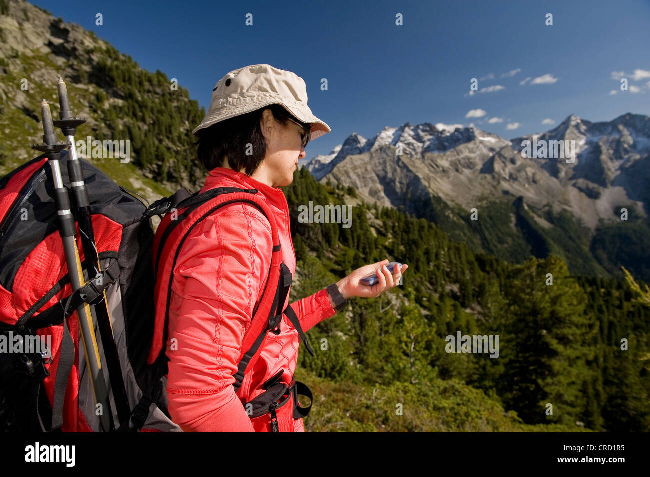Hiker using GPS, Dolomites, South Tyrol, Italy Stock Photo - Alamy