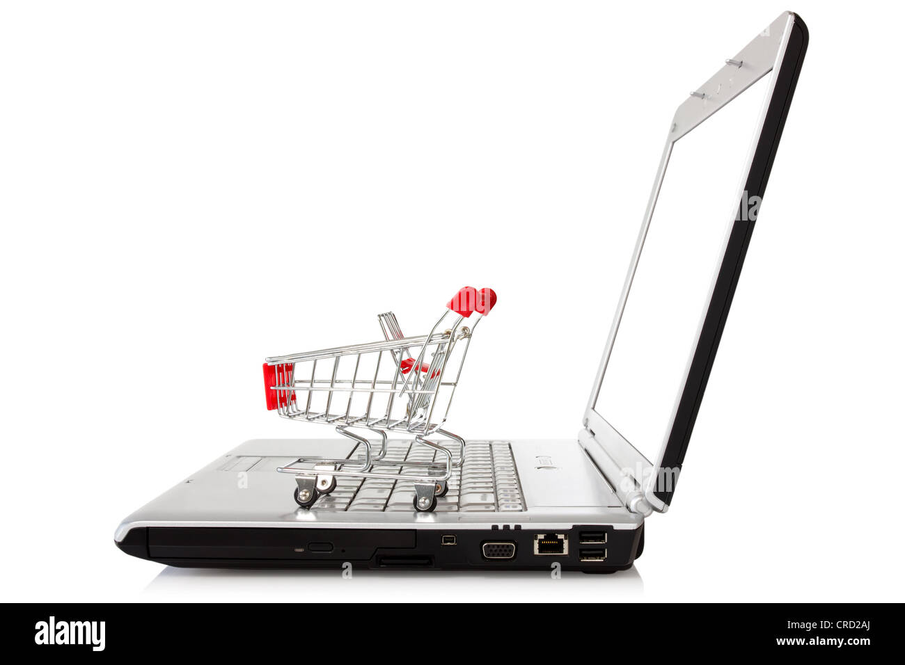 laptop with shopping cart over a white background Stock Photo - Alamy