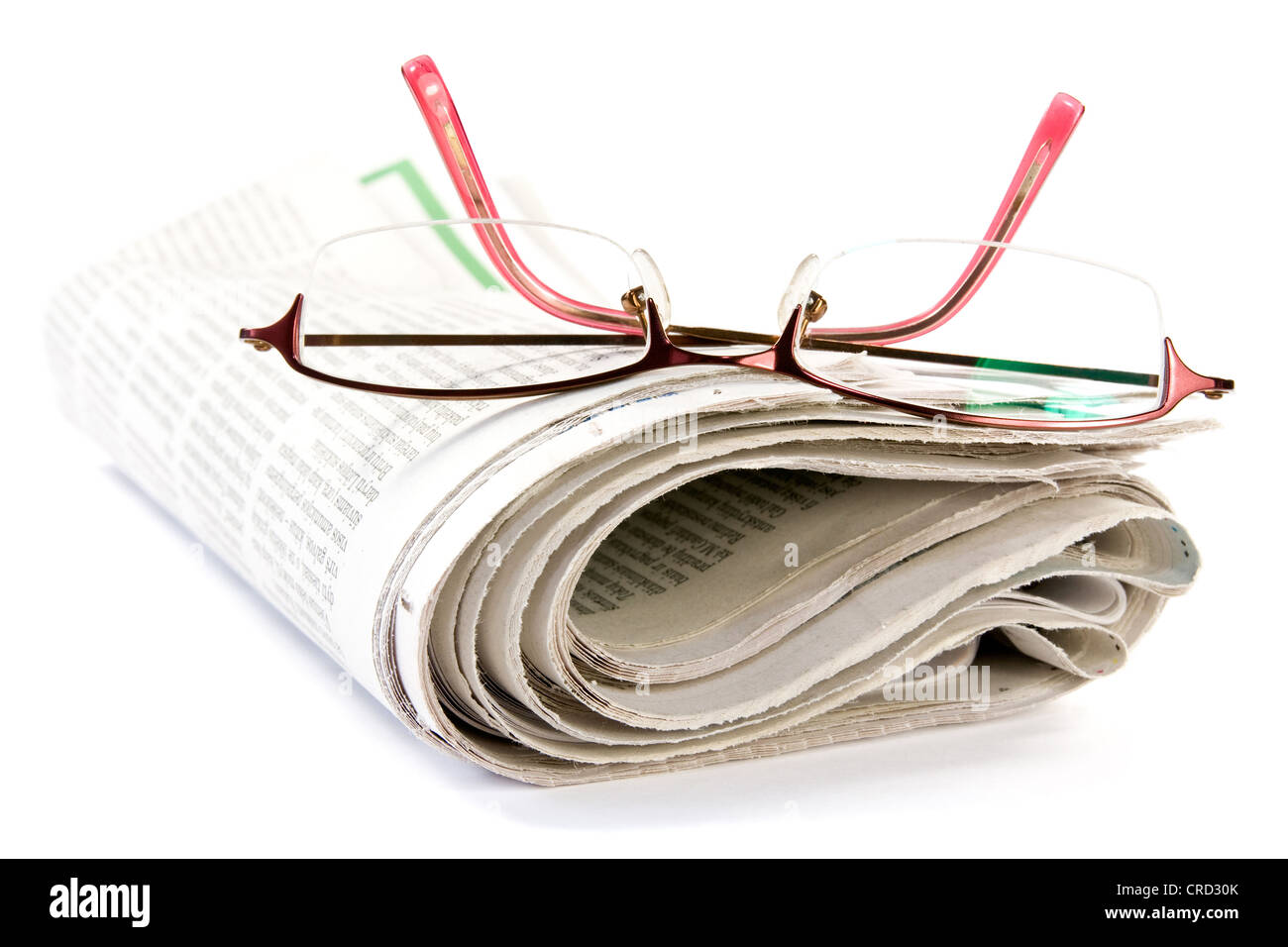 newspaper with glasses over a white background Stock Photo - Alamy