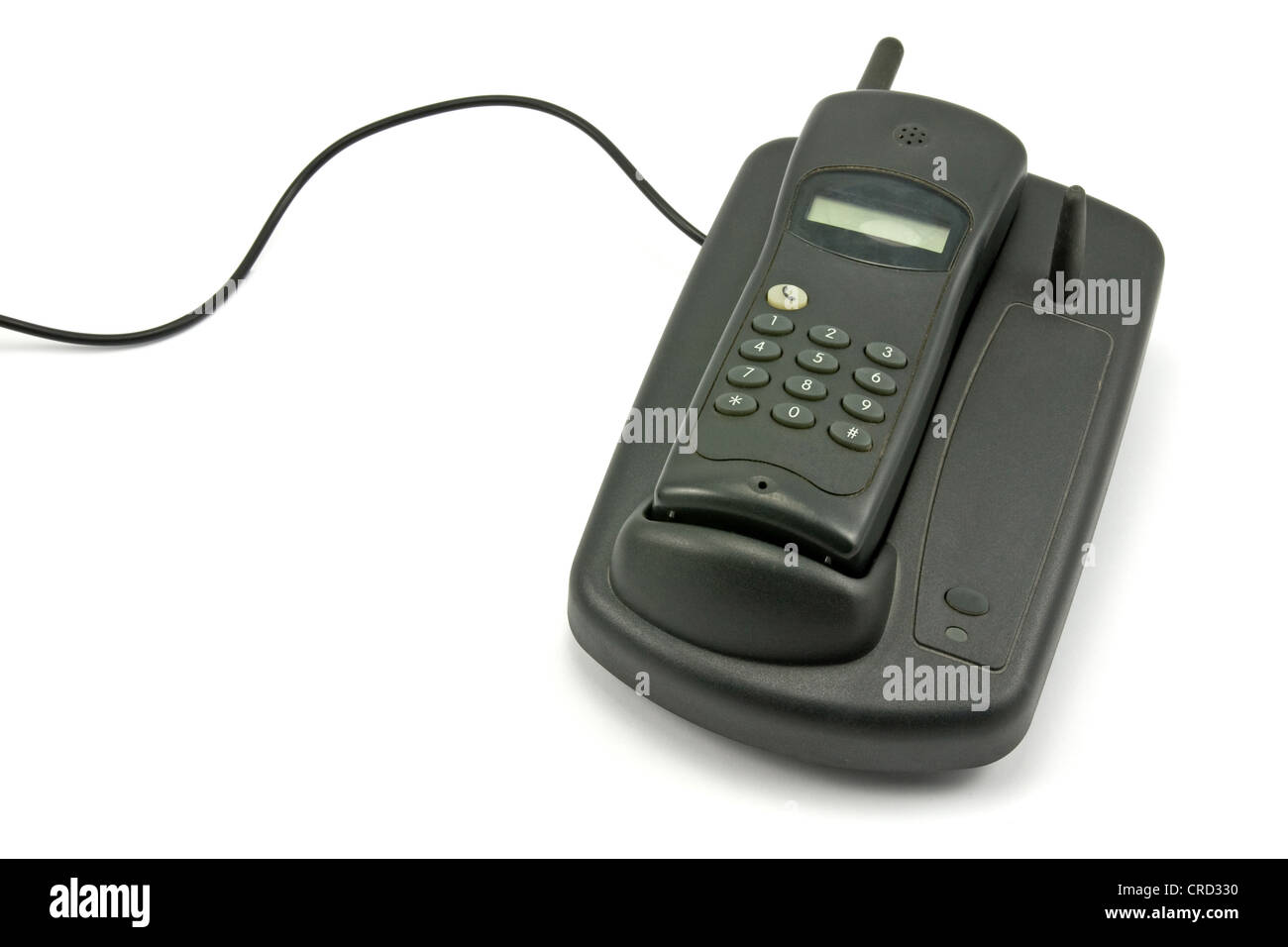 old cordless phone over a white background Stock Photo - Alamy