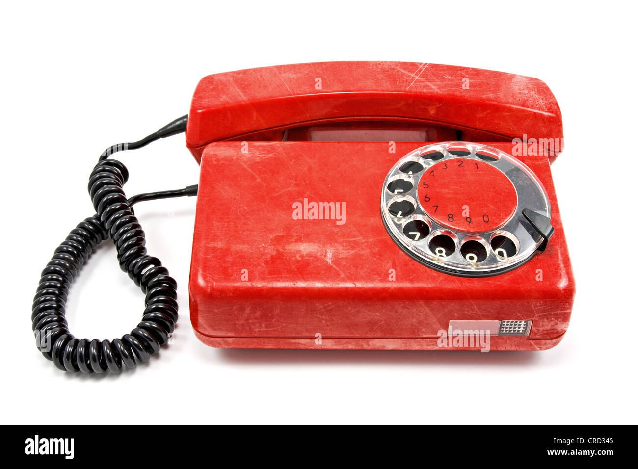 old dirty red telephone on white background Stock Photo - Alamy
