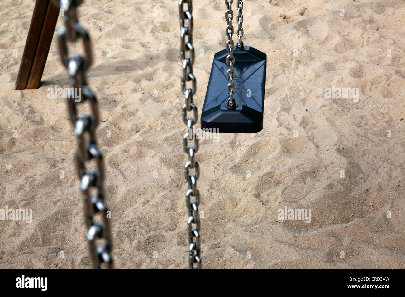 Playground with swing Stock Photo - Alamy
